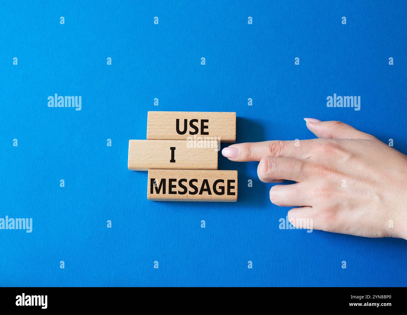Use I message symbol. Concept word Use I message on wooden blocks ...