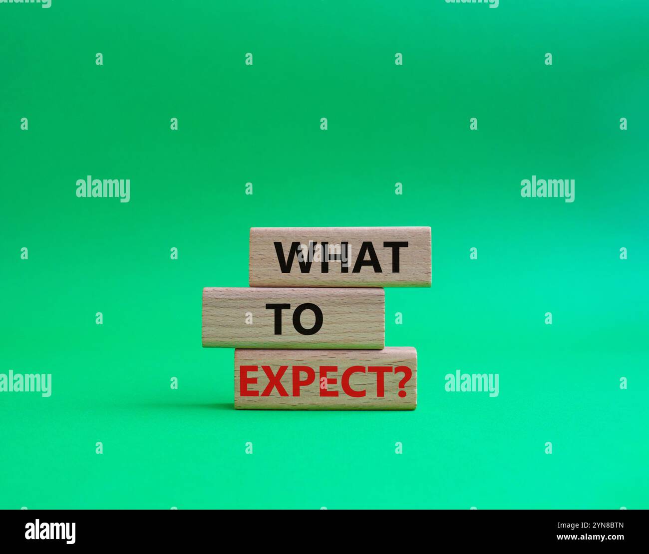 What to Expect symbol. Concept words What to Expect on wooden blocks ...