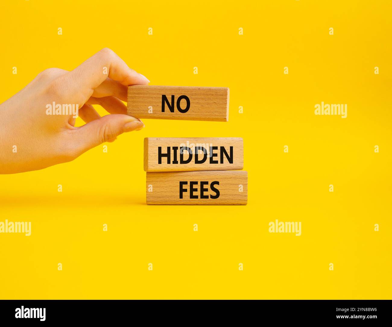 No hidden fees symbol. Concept word No hidden fees on wooden blocks ...