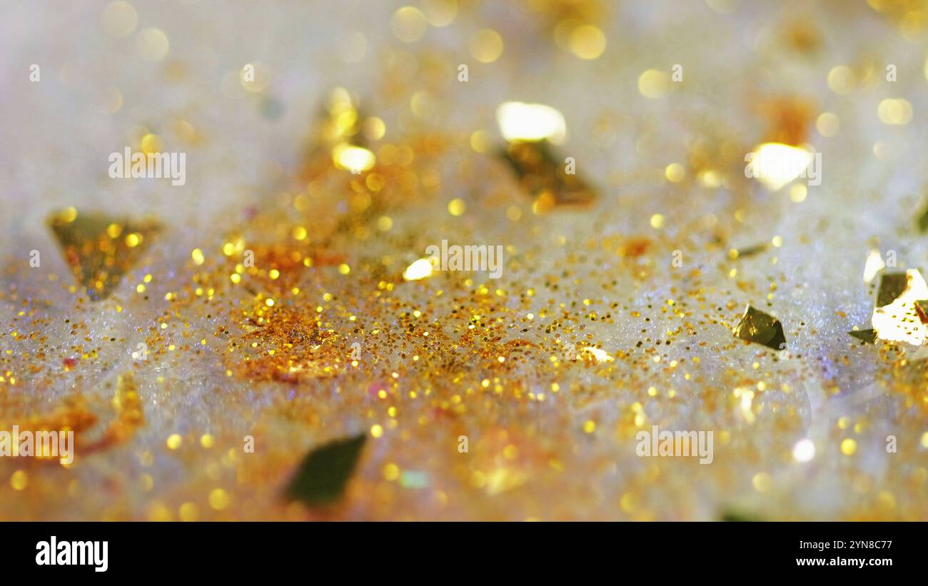 Shimmering liquid. Wet glitter texture. Defocused golden color shiny ...