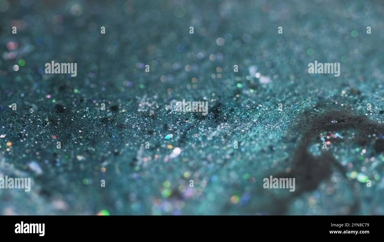 Liquid shimmer paint. Wet glitter drip. Blur teal black color ...