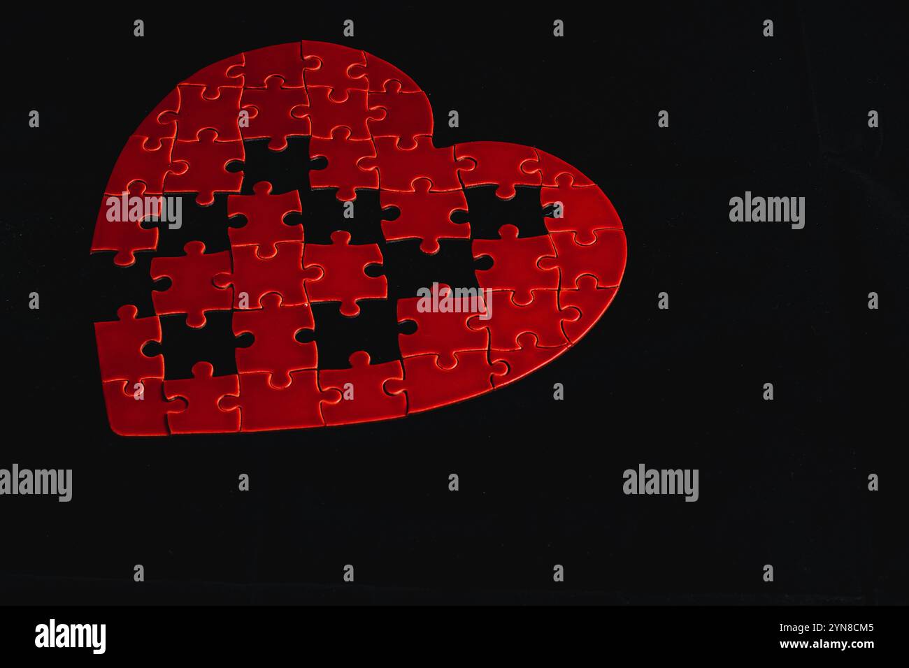 Feelings concept. missing pieces in puzzle, broken love on black ...