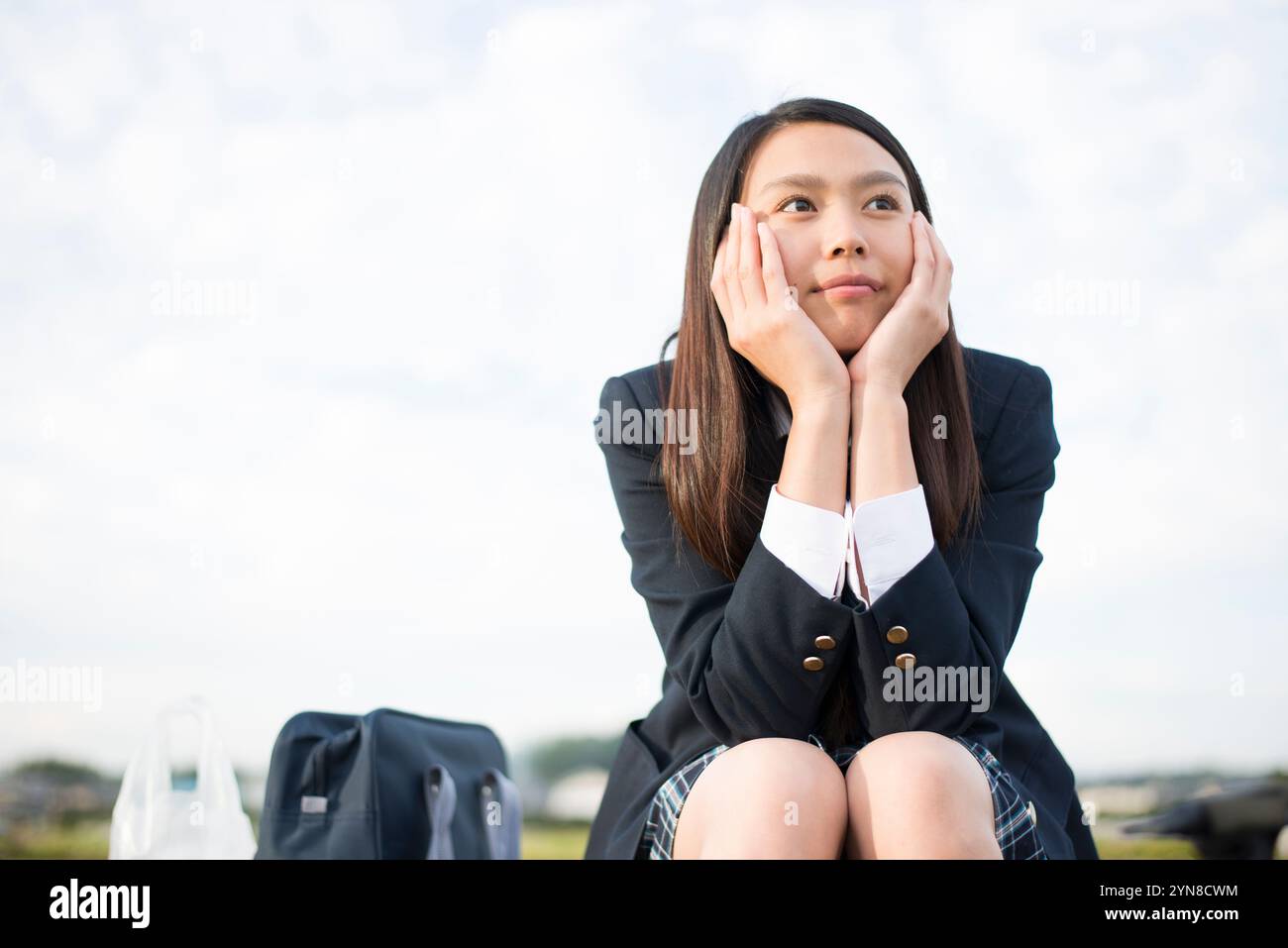 High school girl in school uniform with cheekbones Stock Photo - Alamy