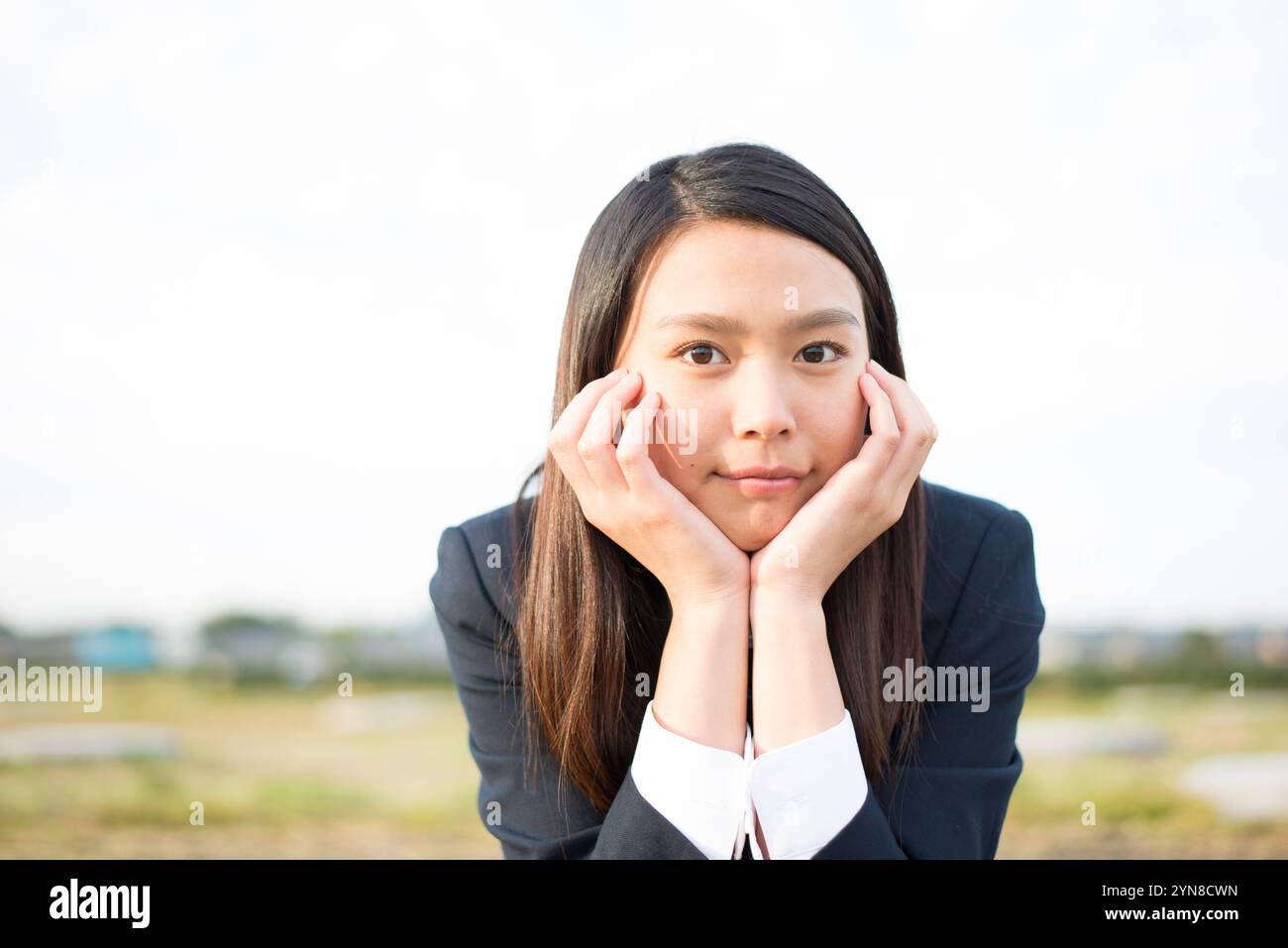 High school girl in school uniform with cheekbones Stock Photo - Alamy