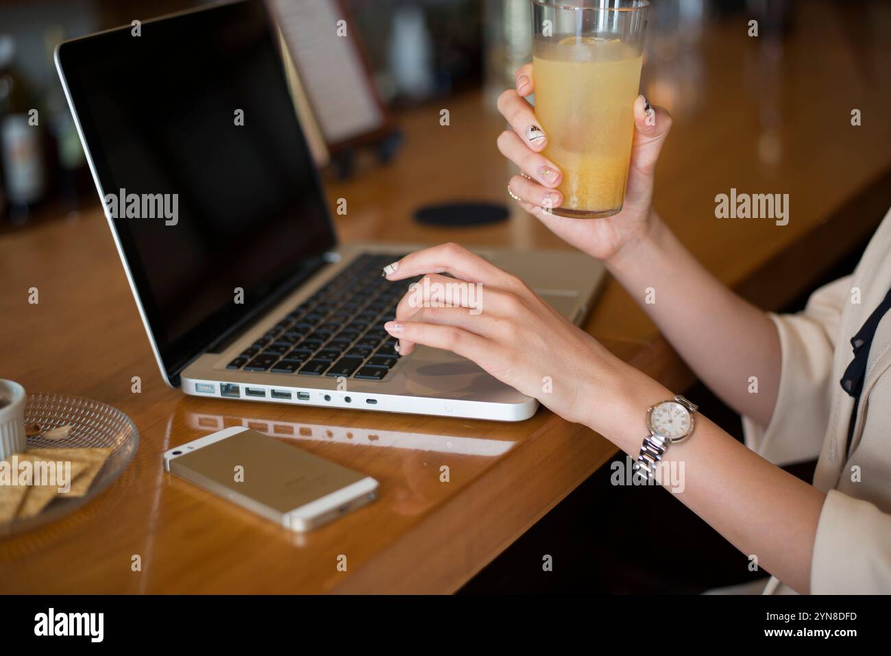 Woman working in a bar hi-res stock photography and images - Alamy