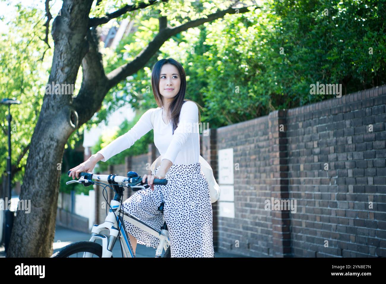 Woman astride hi-res stock photography and images - Alamy