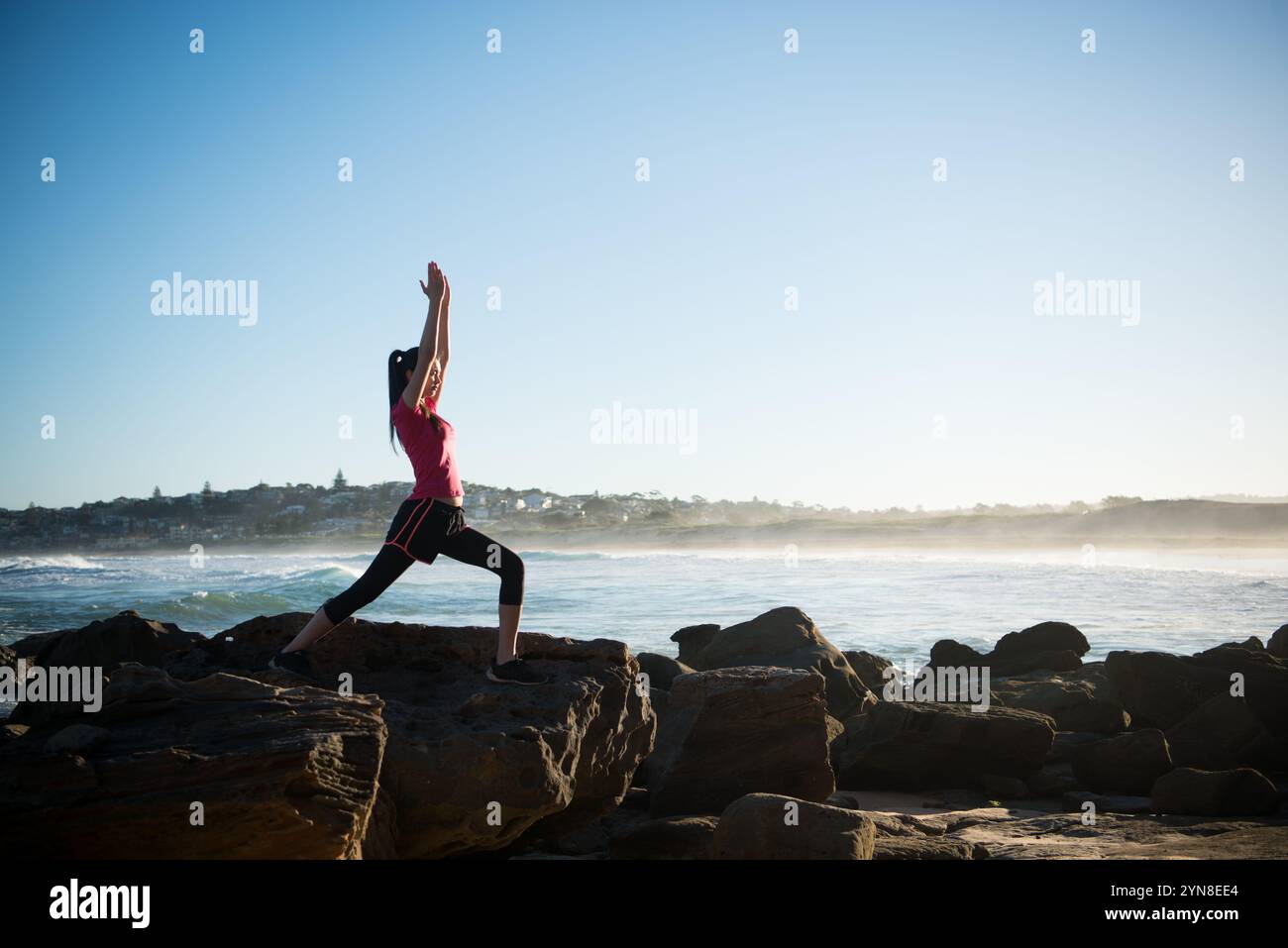 Woman doing yoga poses Stock Photo - Alamy