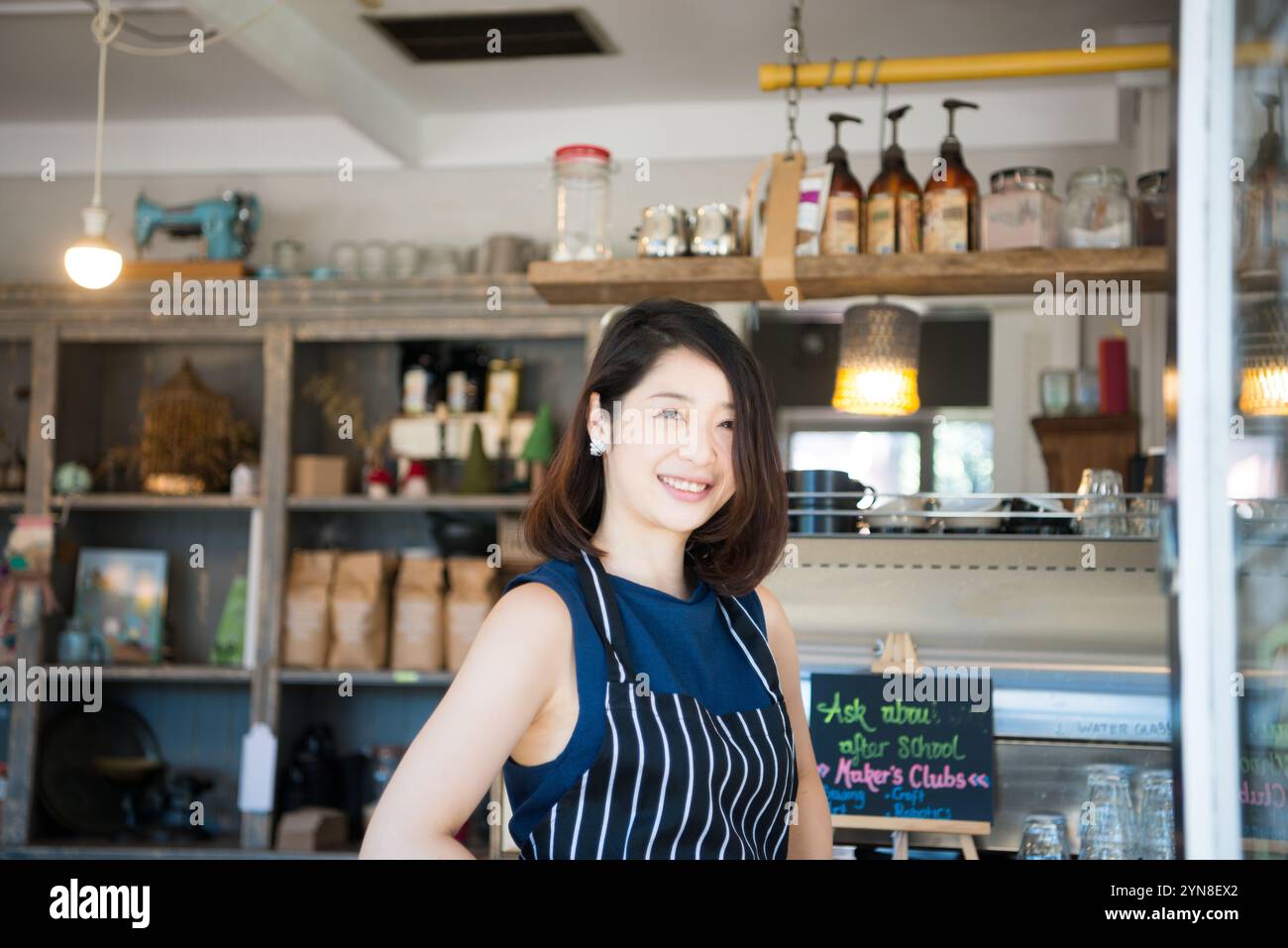 A waitress working in a café Stock Photo - Alamy