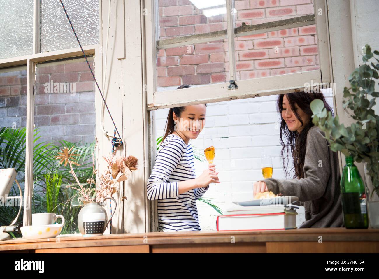 Women home chat hi-res stock photography and images - Alamy