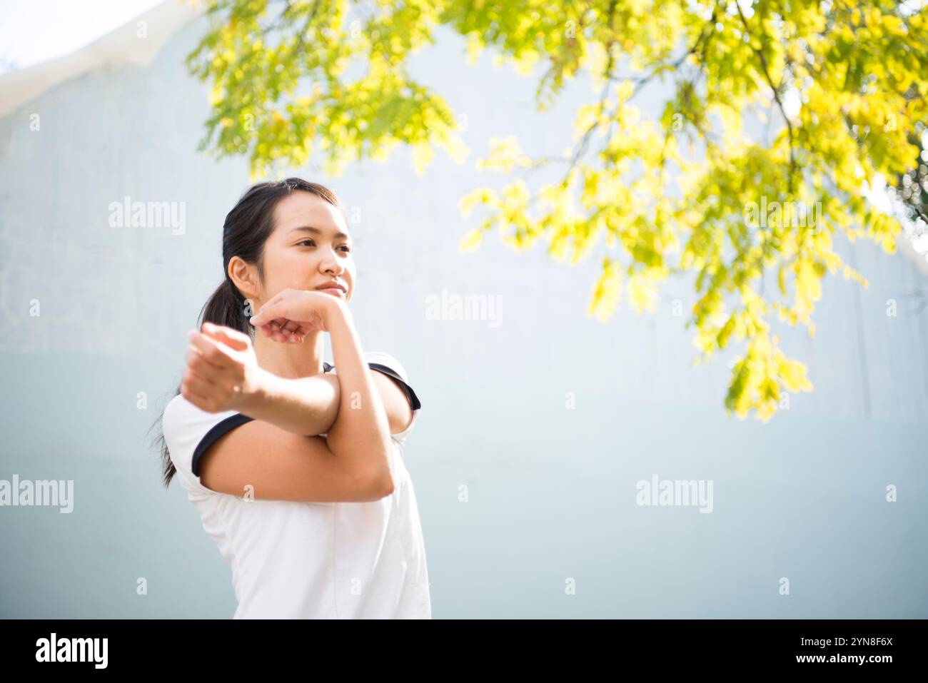 Women in training wear stretching Stock Photo - Alamy