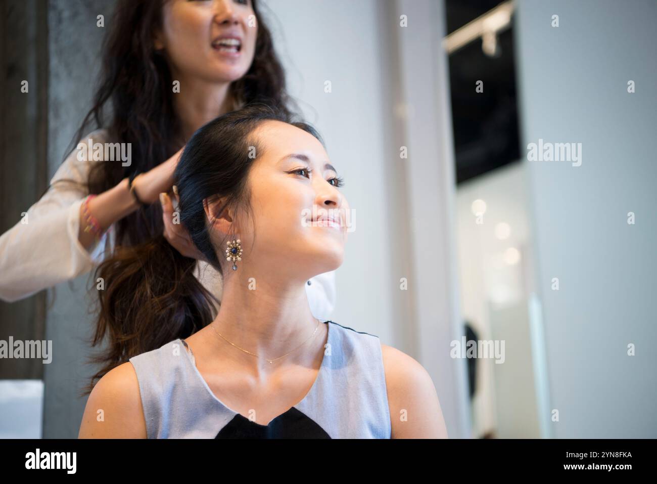 Woman having her hair done at a beauty salon Stock Photo - Alamy