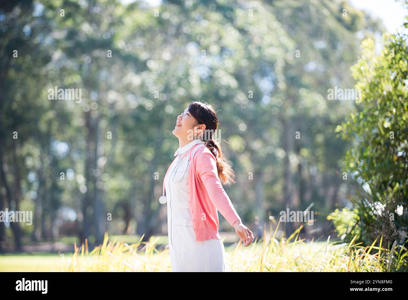 Nurse taking a deep breath Stock Photo - Alamy