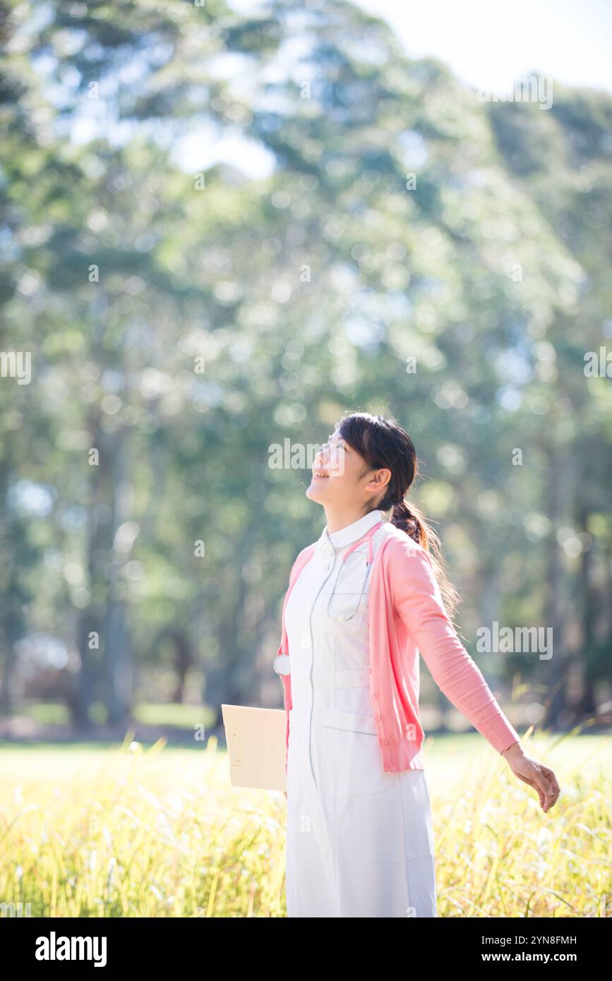 Nurse taking a deep breath Stock Photo - Alamy