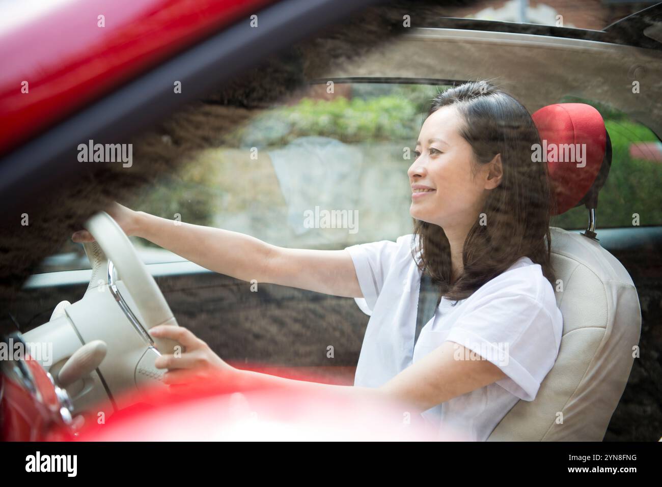 Woman driving a car Stock Photo - Alamy