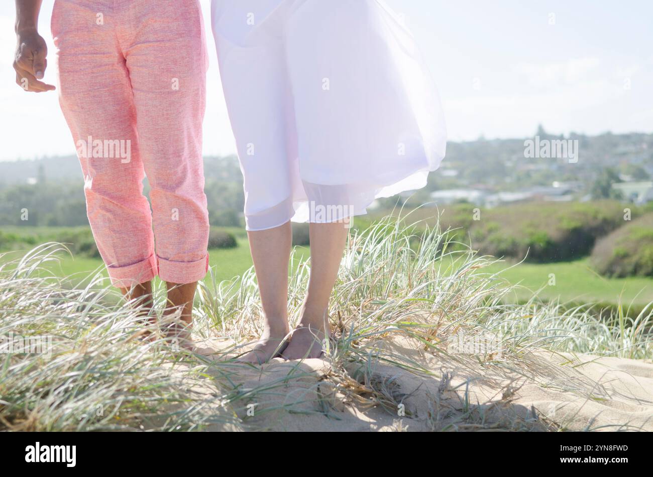 Couple on foot Stock Photo - Alamy