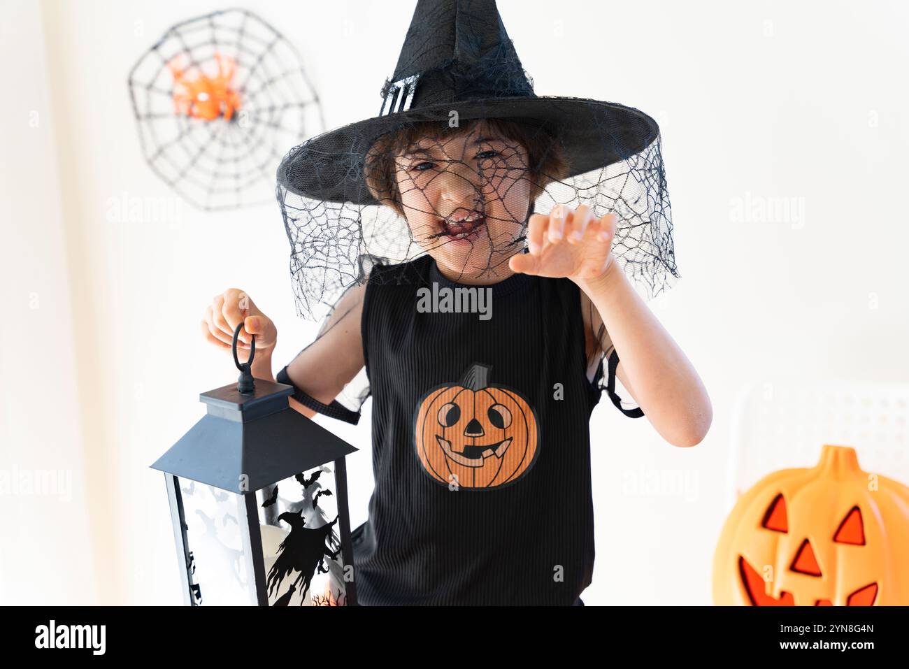 Girls posing in Halloween costumes Stock Photo - Alamy