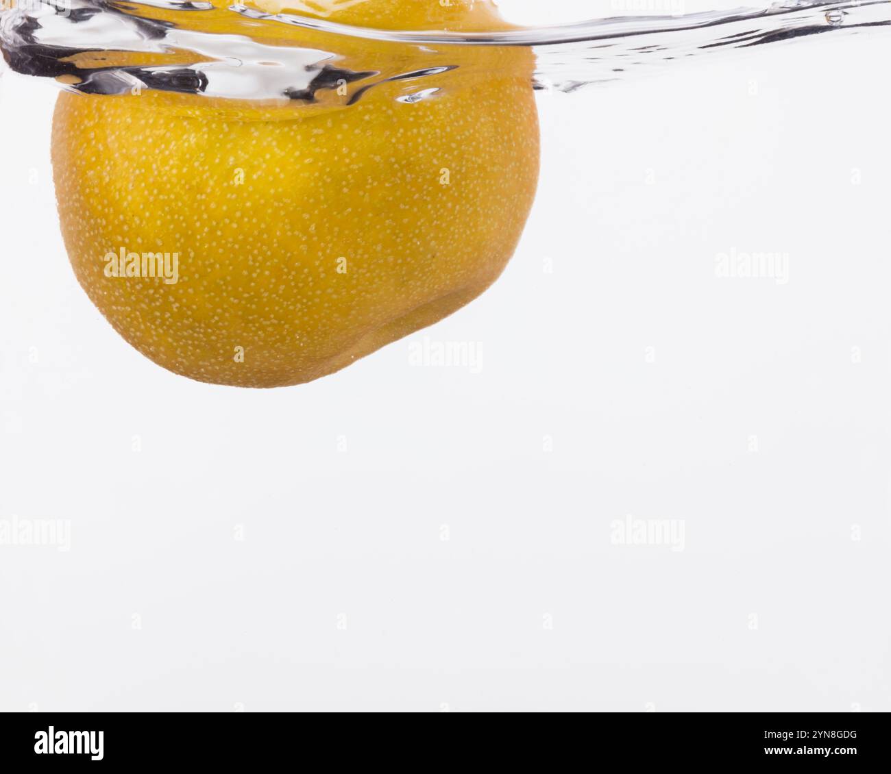 Pears floating on water Stock Photo - Alamy