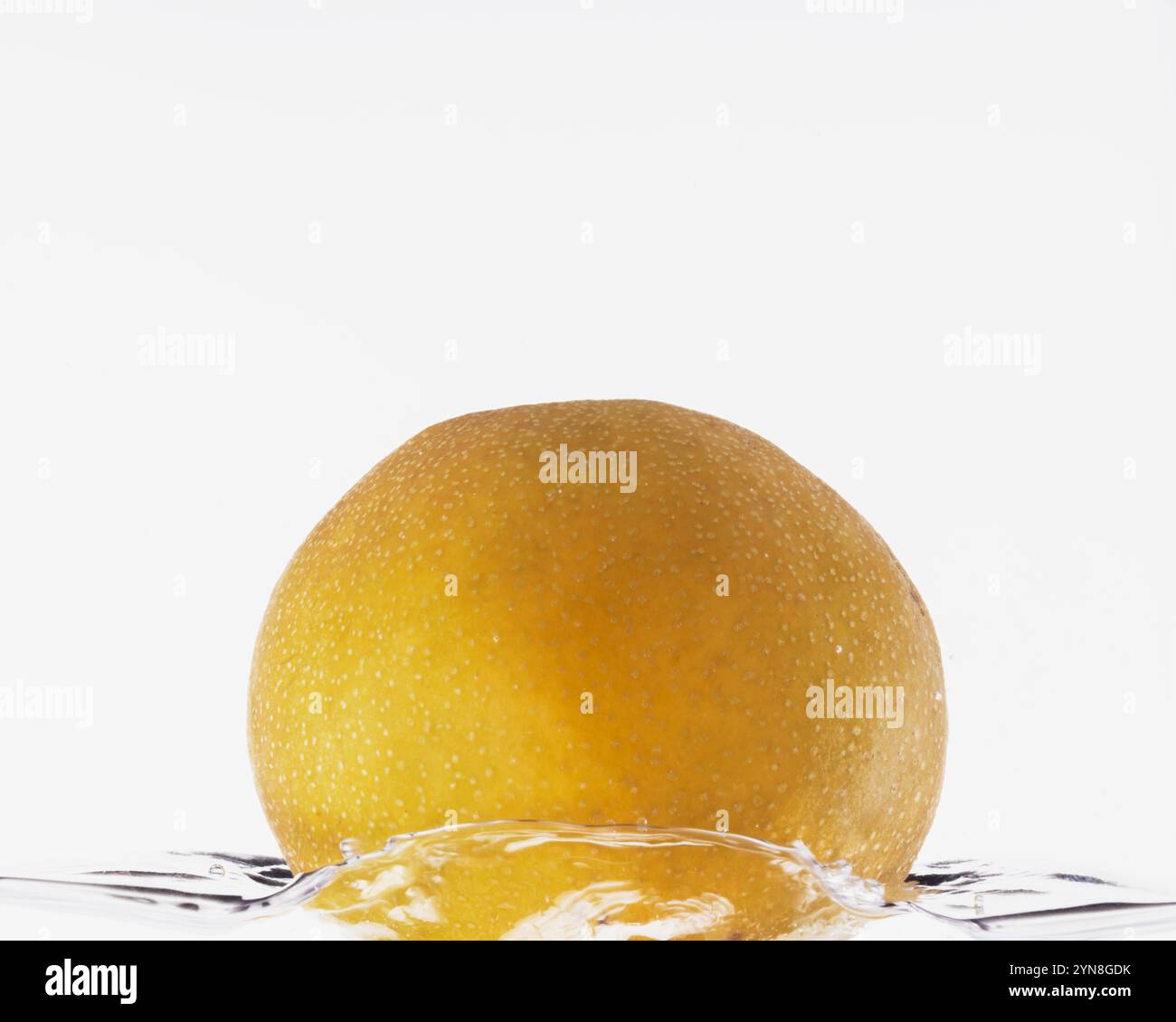 Pears floating on water Stock Photo - Alamy