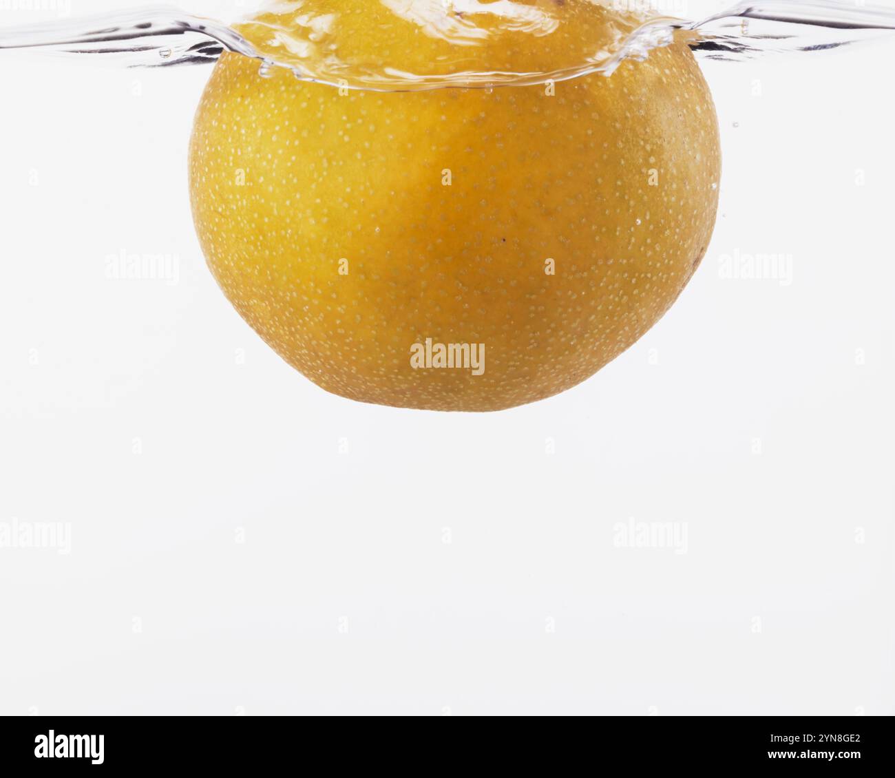 Pears floating on water Stock Photo - Alamy