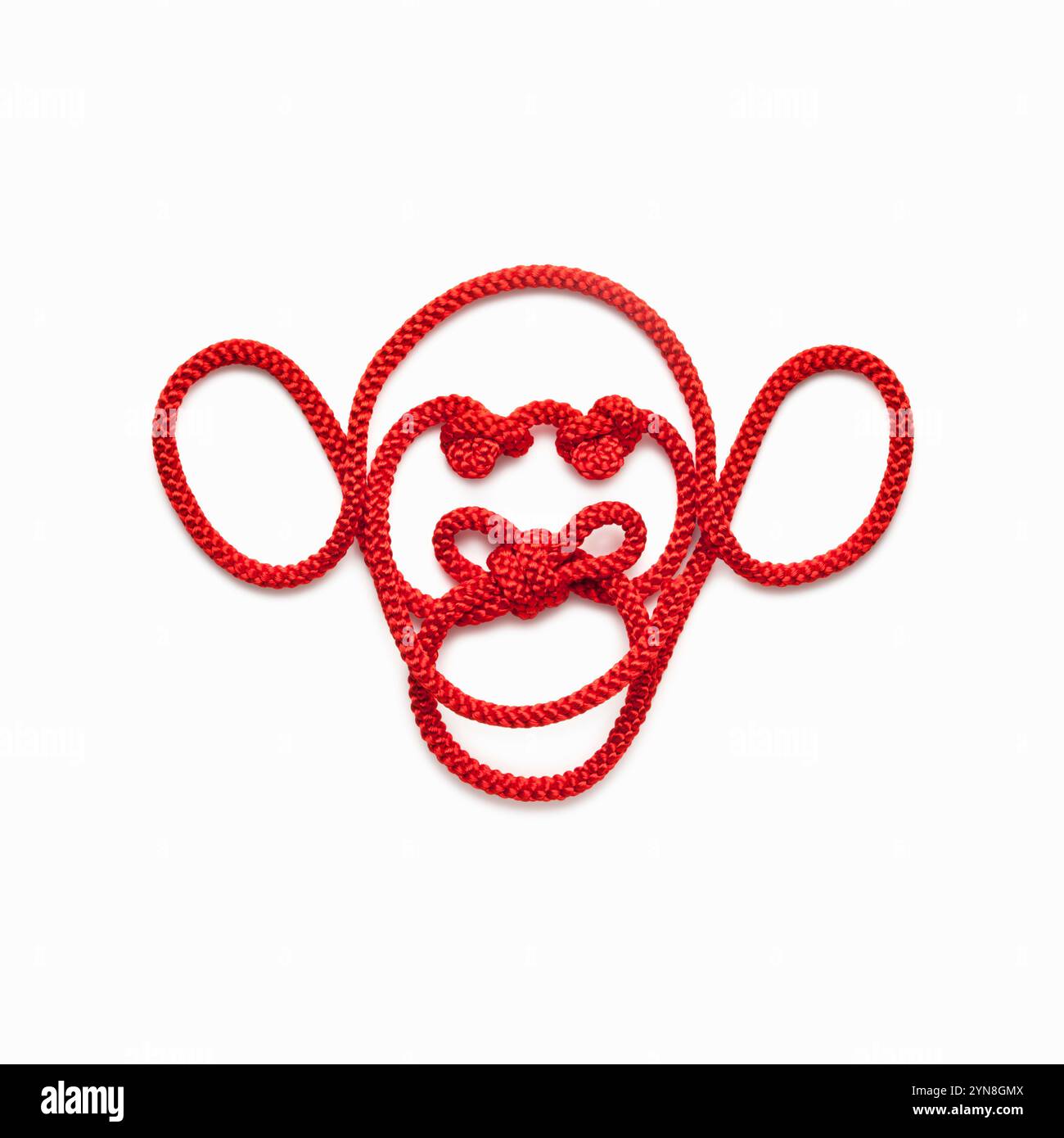 Image of a face made with red string Stock Photo - Alamy