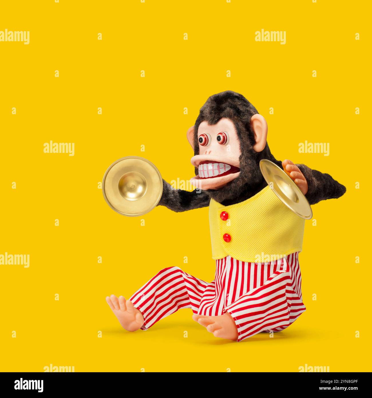 Toy monkey clapping cymbals Stock Photo - Alamy