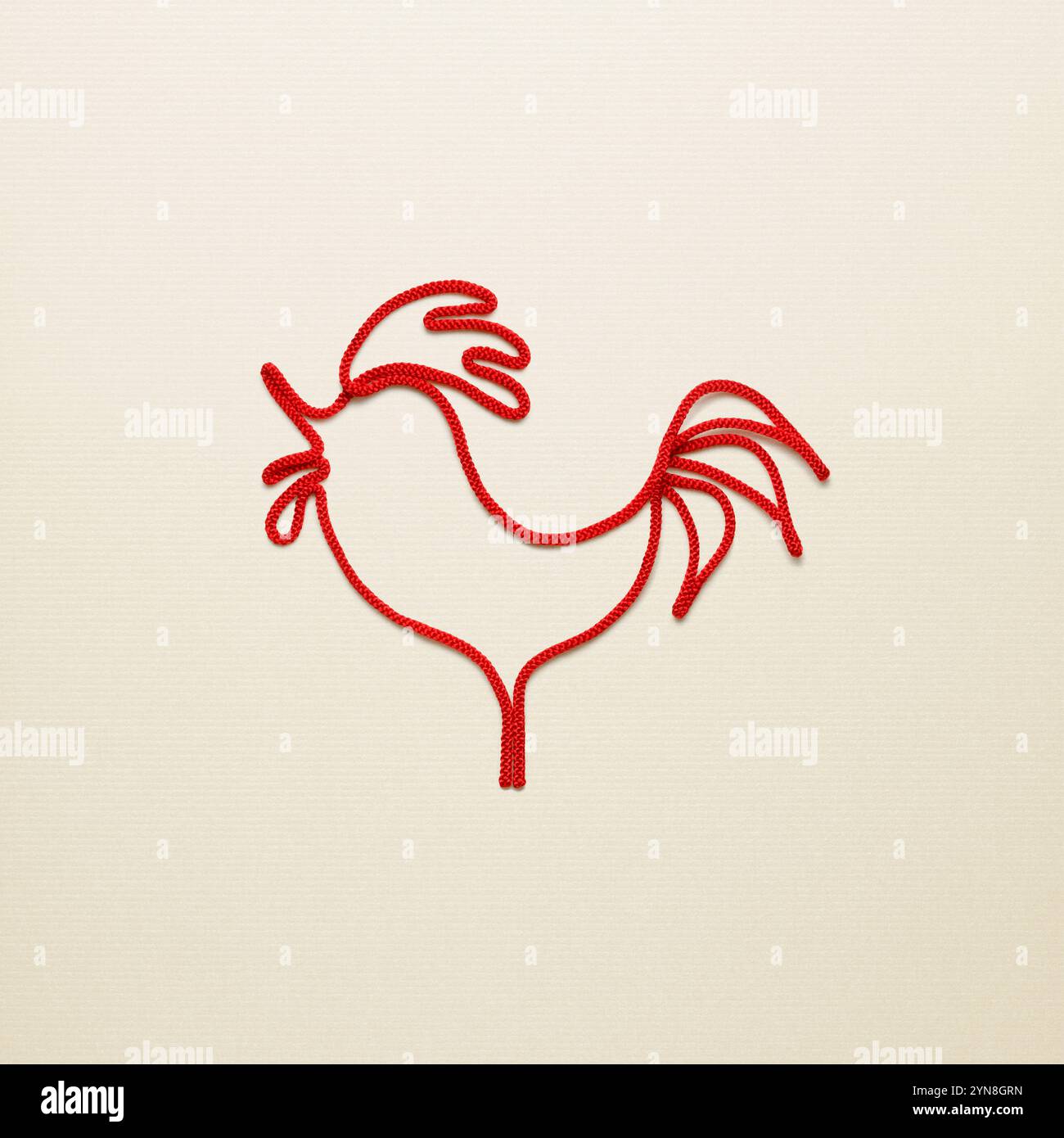 Image of a chicken (rooster) made with red string Stock Photo - Alamy