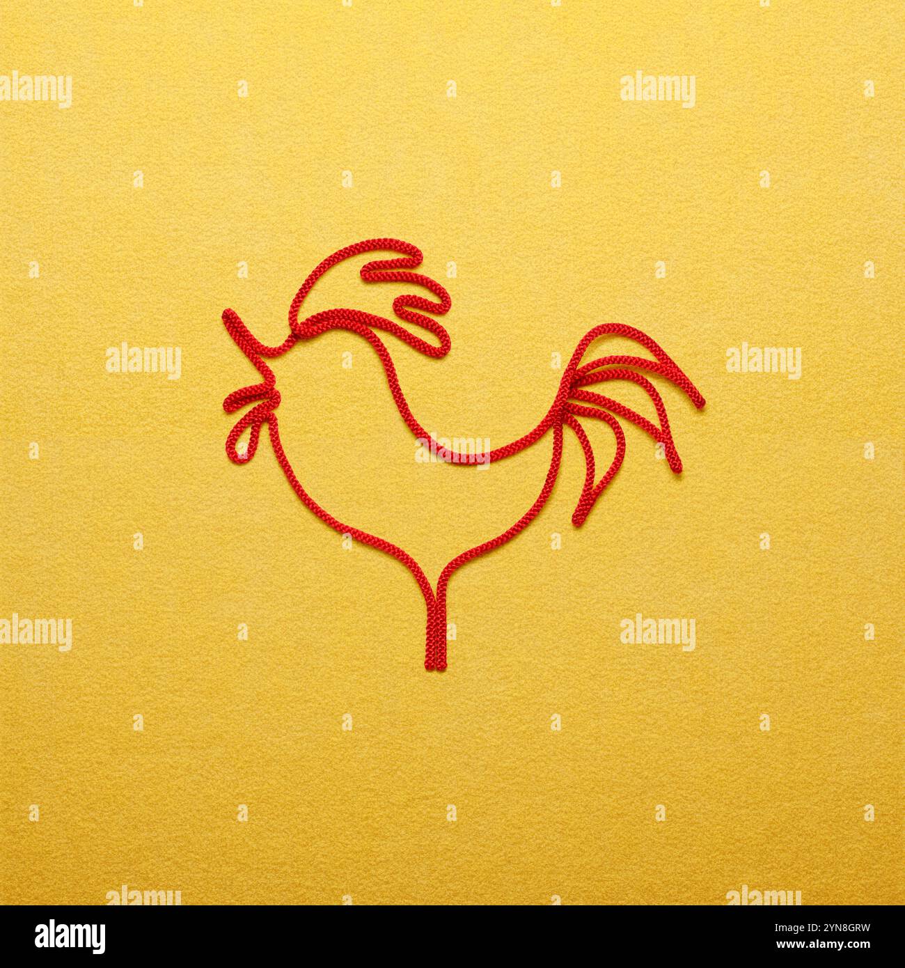 Image of a chicken (rooster) made with red string Stock Photo - Alamy