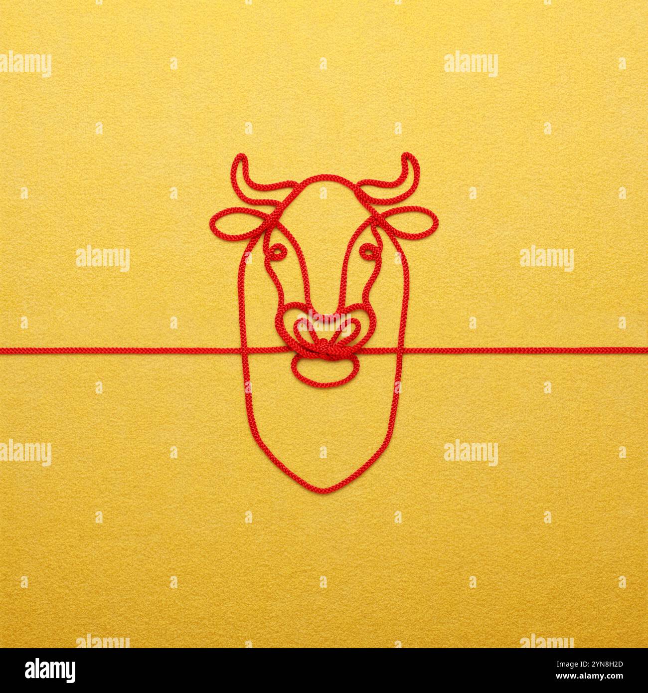 Image of an ox made with red string Stock Photo - Alamy