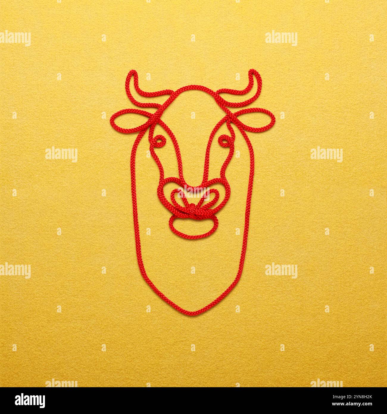 Image of an ox made with red string Stock Photo - Alamy