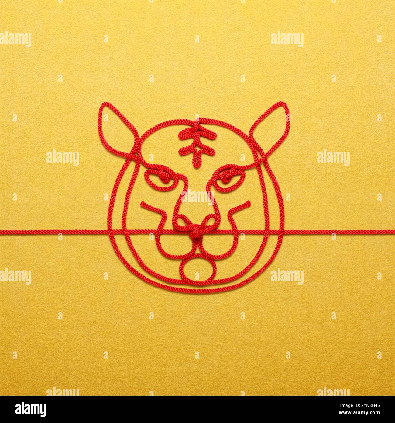 Image of a tiger made with red string Stock Photo - Alamy