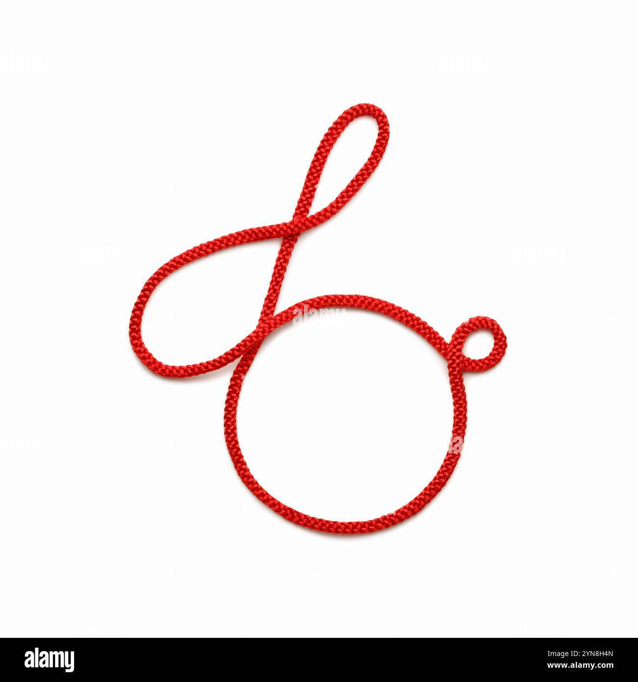 Image of a rabbit made with red string Stock Photo - Alamy