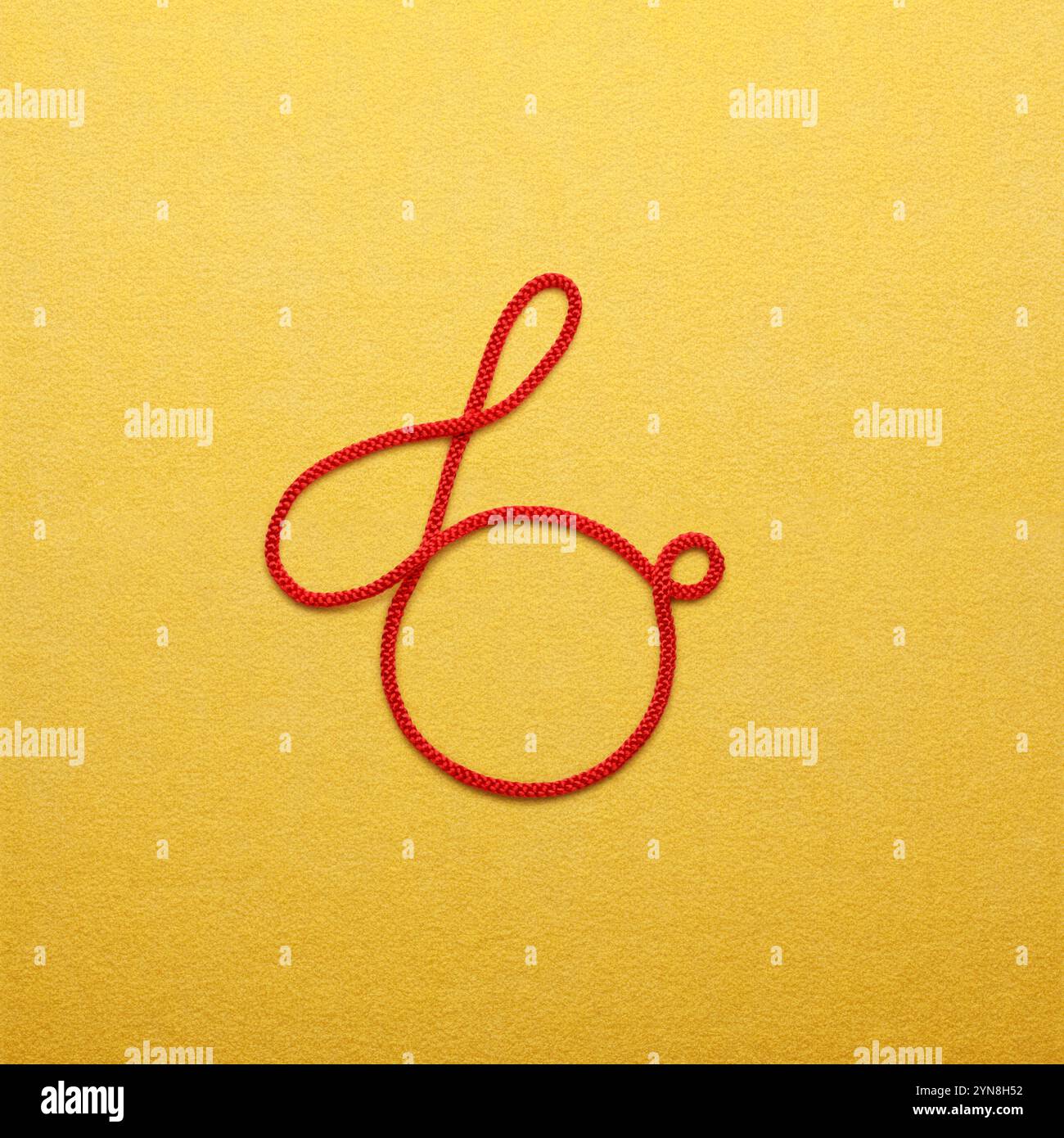 Image of a rabbit made with red string Stock Photo - Alamy
