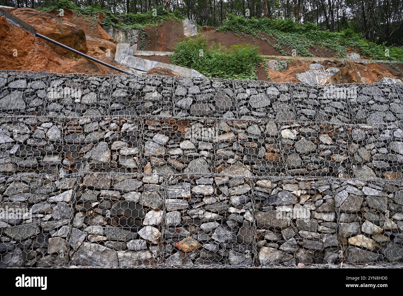 A view of the newly built gabion wall barriers that are made of ...