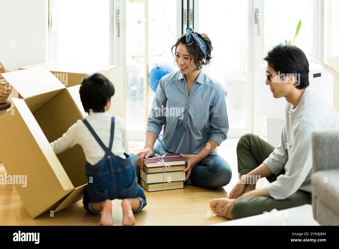 Family working on the move Stock Photo - Alamy