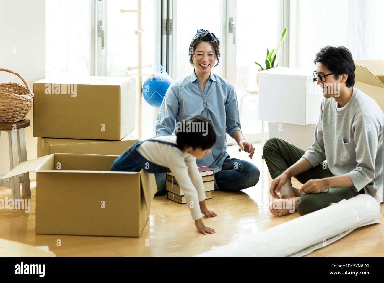 Family working on the move Stock Photo - Alamy