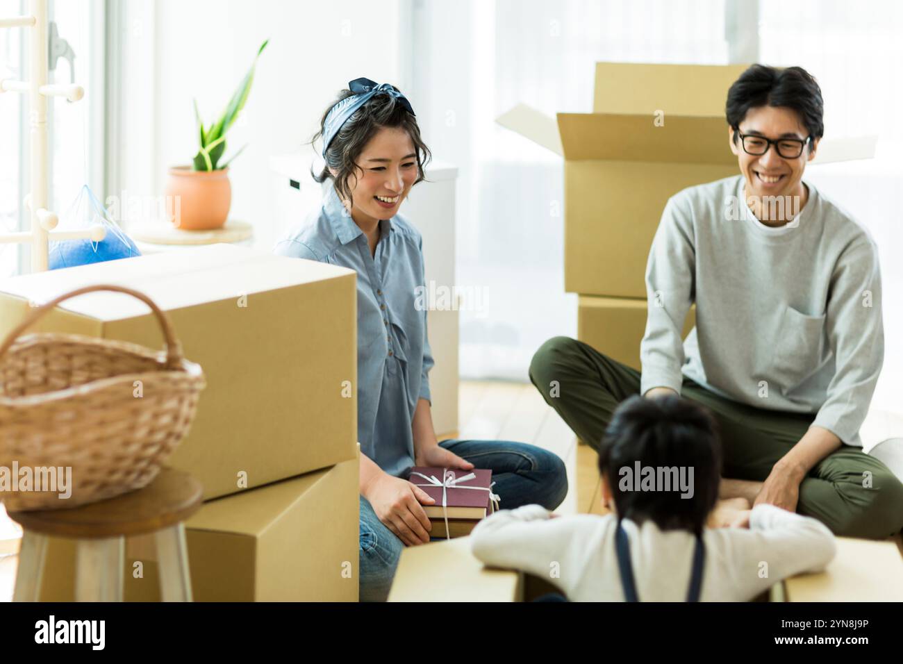 Family working on the move Stock Photo - Alamy