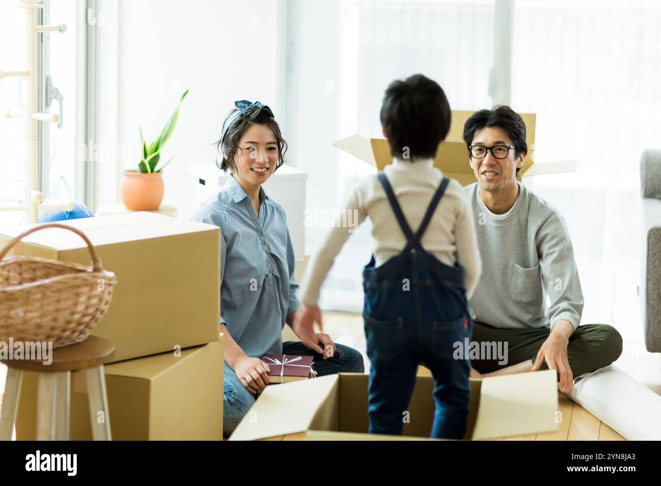 Family working on the move Stock Photo - Alamy