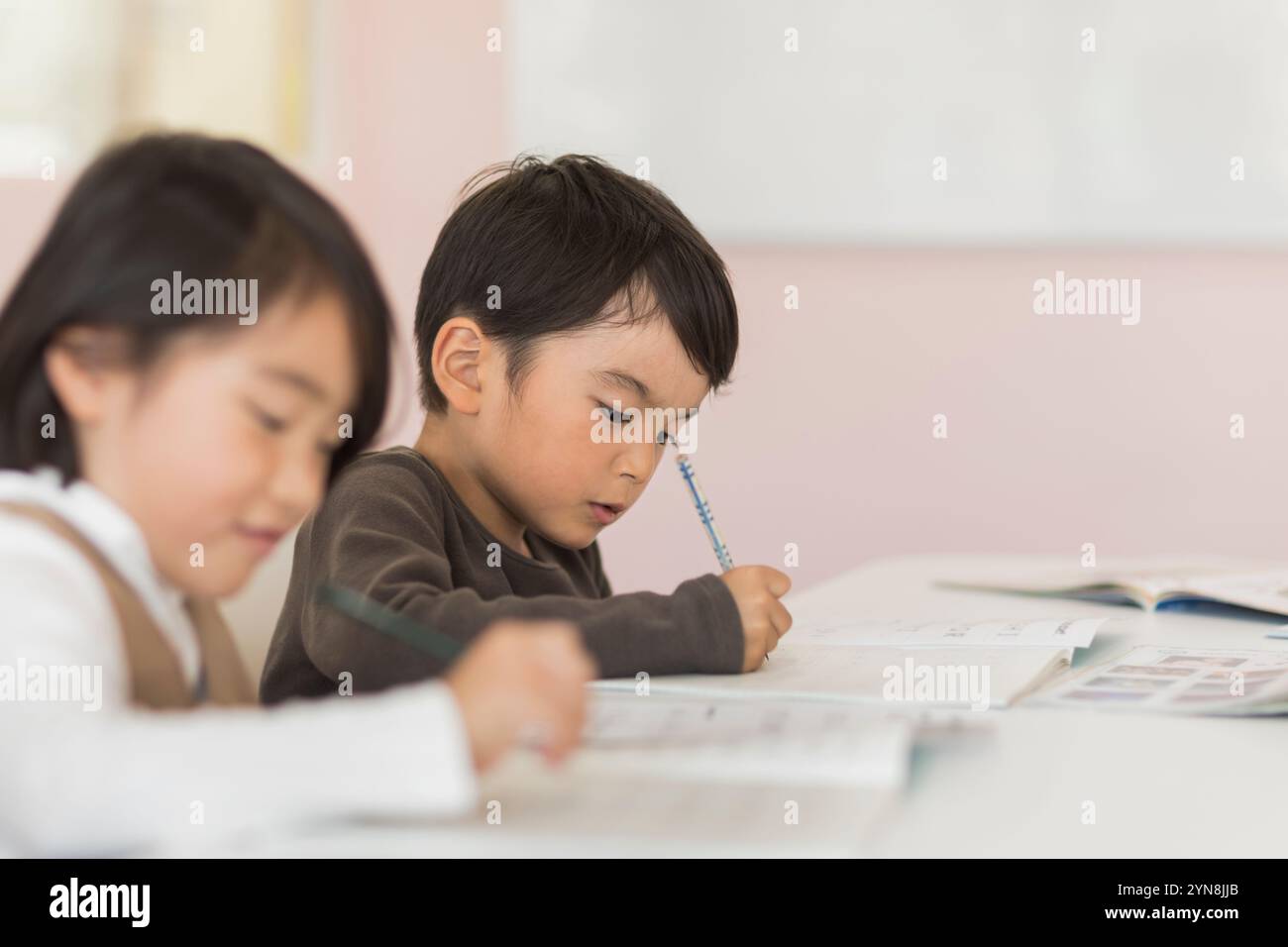 Children studying in the classroom Stock Photo - Alamy