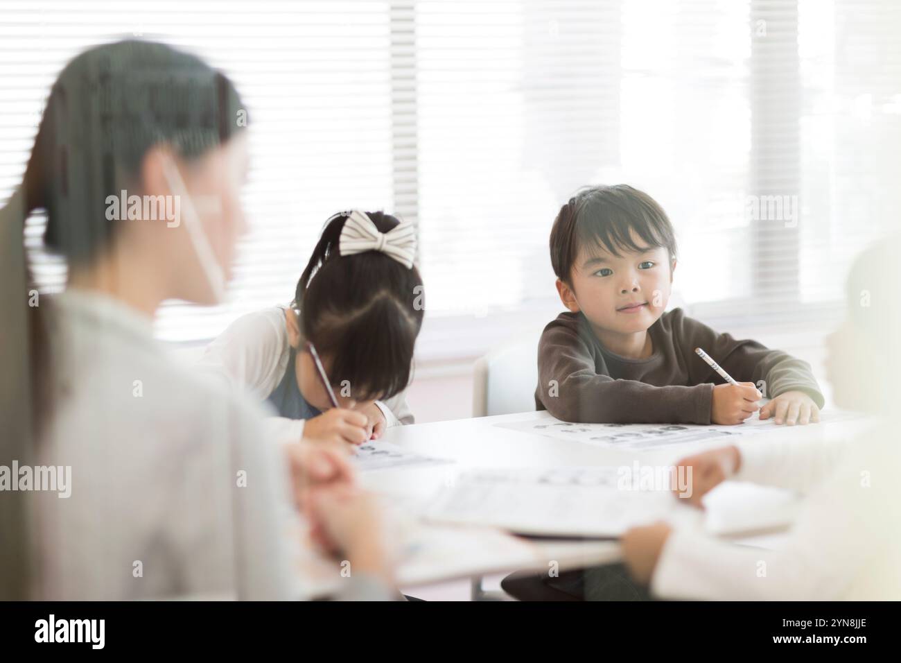 Children studying in the classroom Stock Photo - Alamy