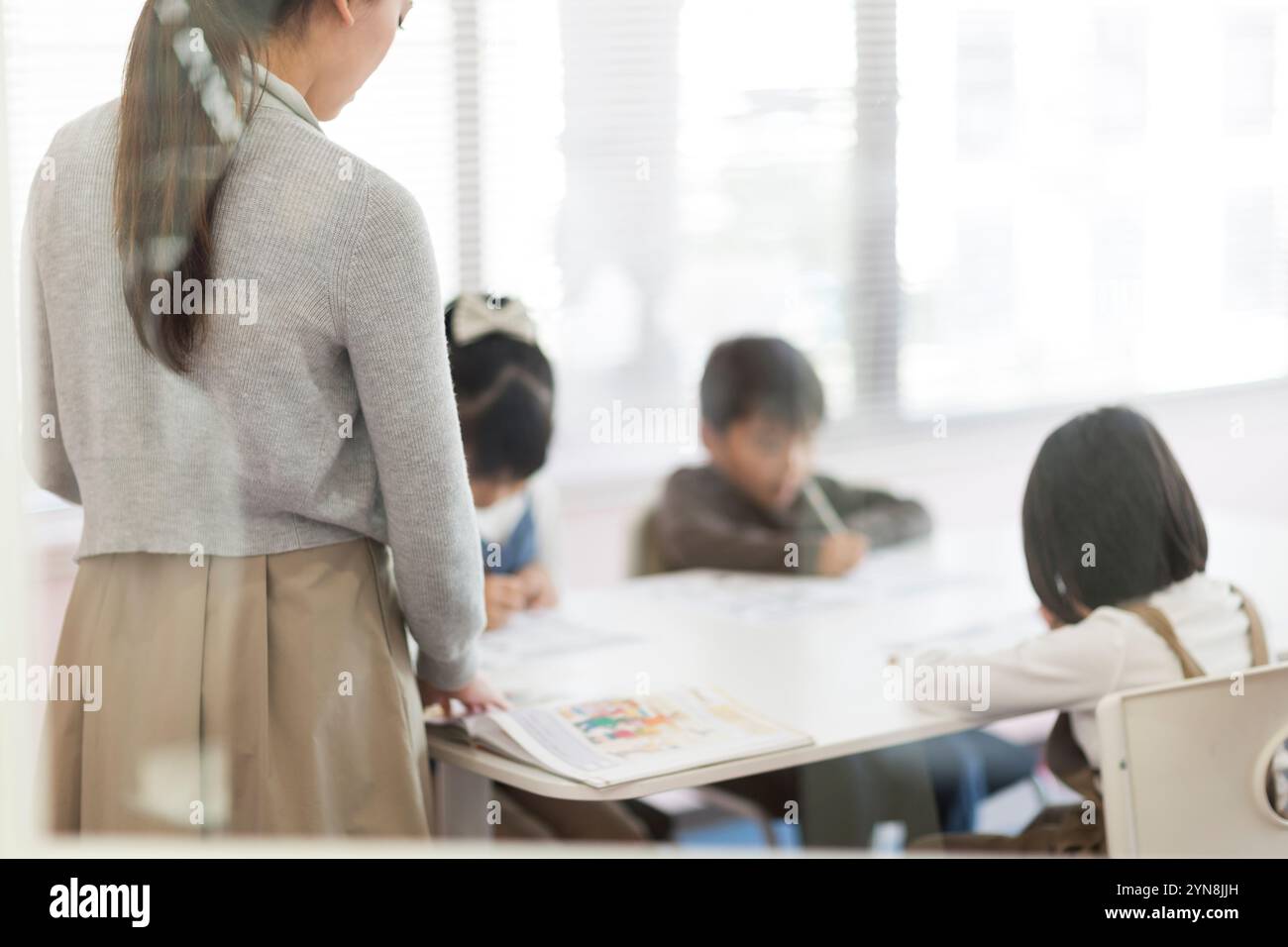 Children studying in the classroom Stock Photo - Alamy
