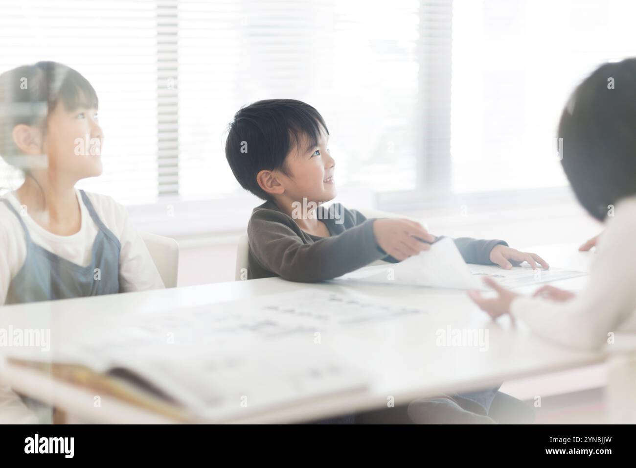 Children taking a class in a classroom Stock Photo - Alamy