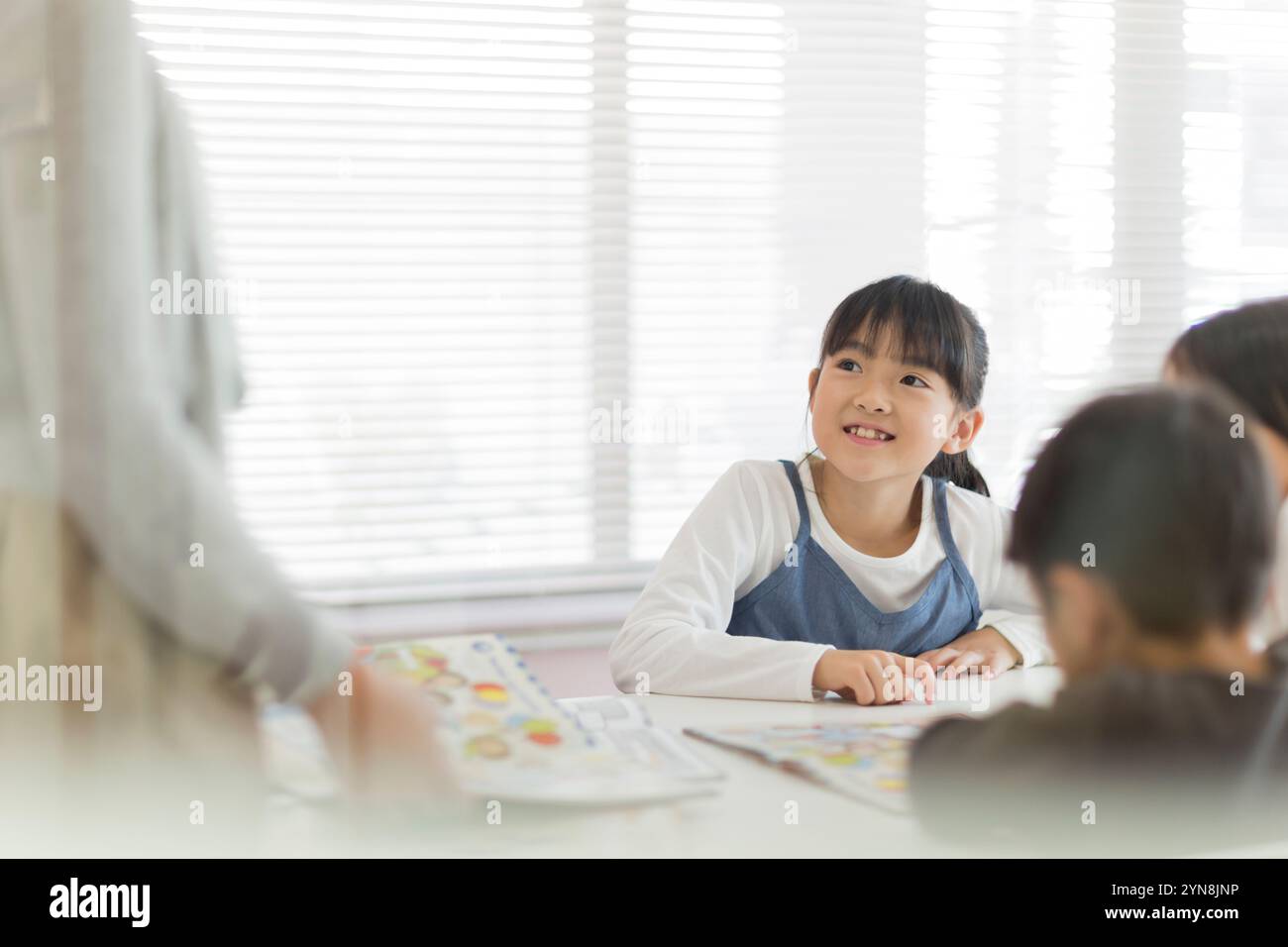 Children taking a class in a classroom Stock Photo - Alamy