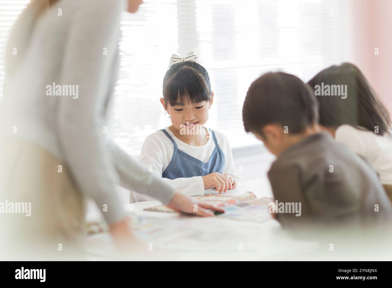 Children taking a class in a classroom Stock Photo - Alamy