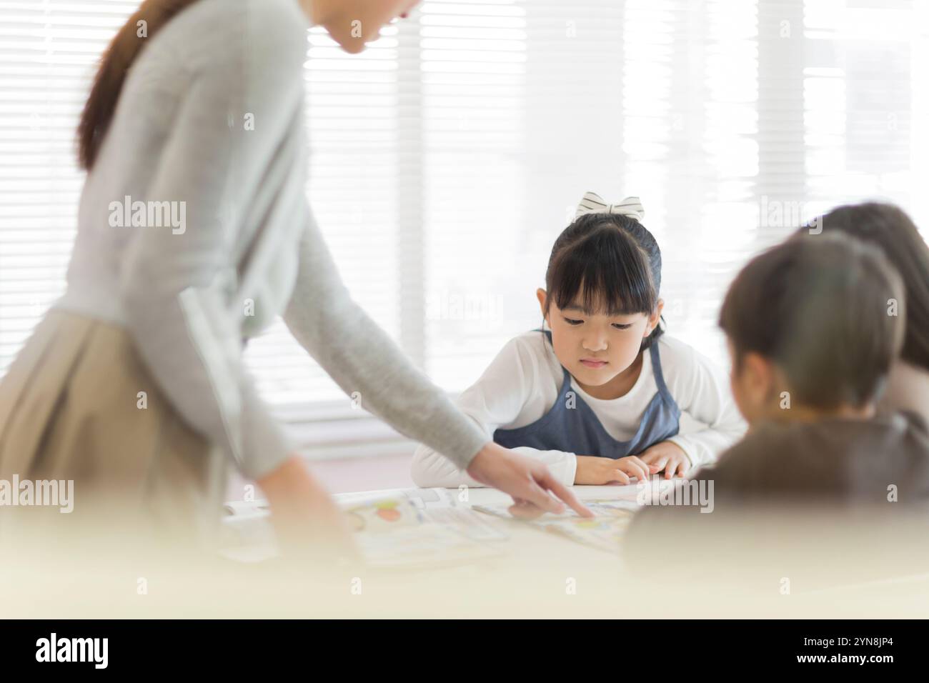 Children taking a class in a classroom Stock Photo - Alamy