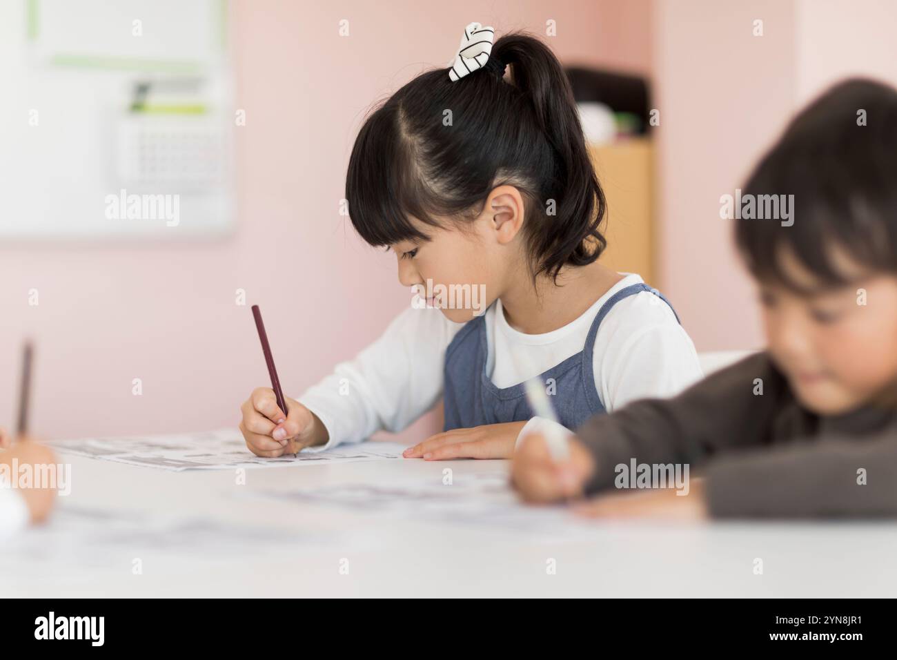 Children studying in the classroom Stock Photo - Alamy