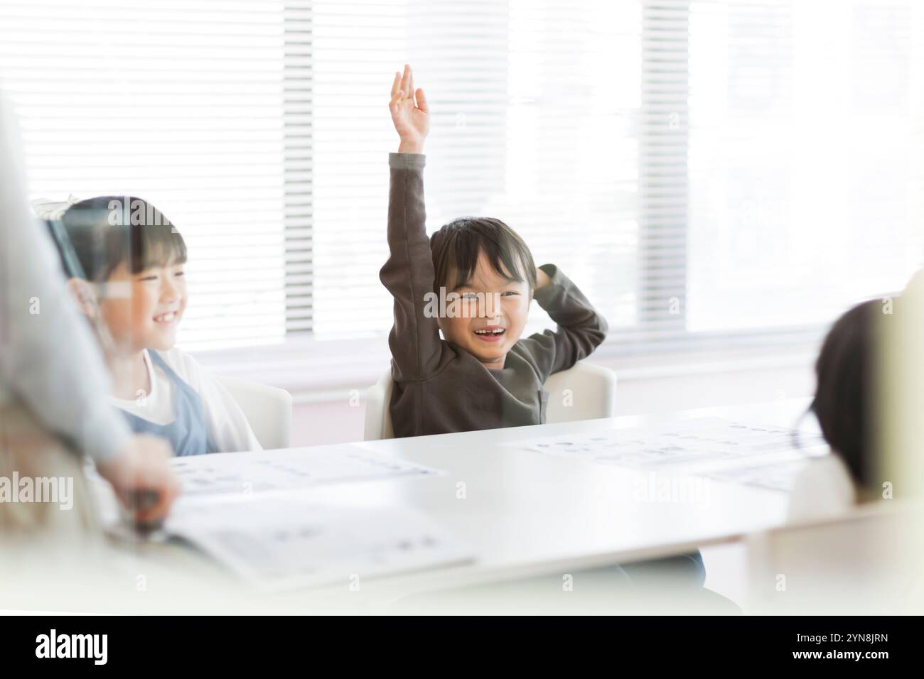 Children taking a class in a classroom Stock Photo - Alamy