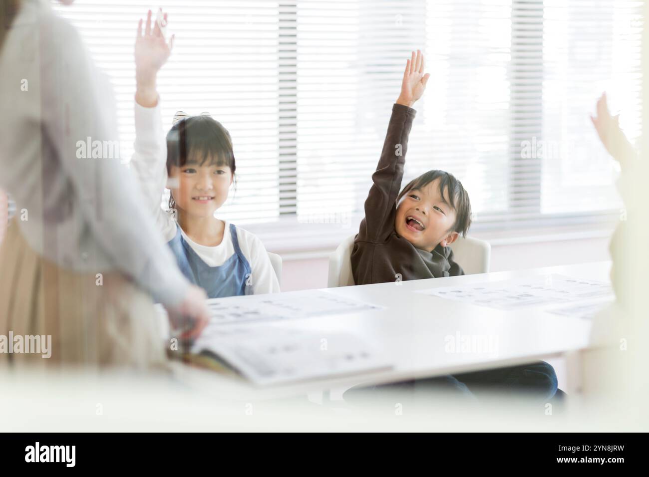 Children taking a class in a classroom Stock Photo - Alamy