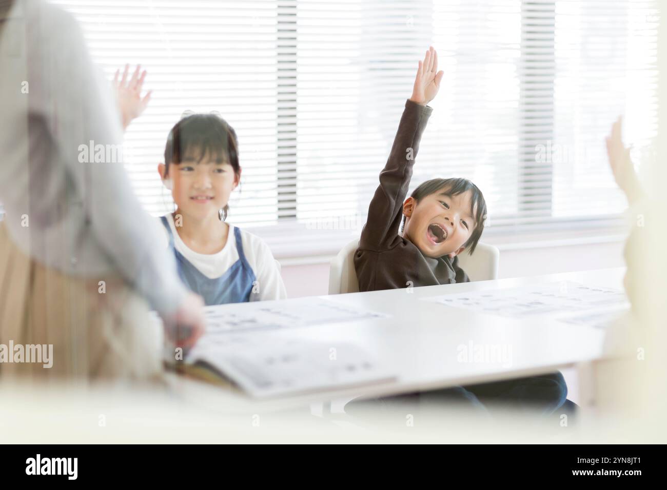 Children taking a class in a classroom Stock Photo - Alamy