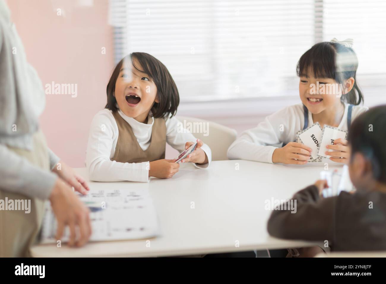 Children taking a class in a classroom Stock Photo - Alamy