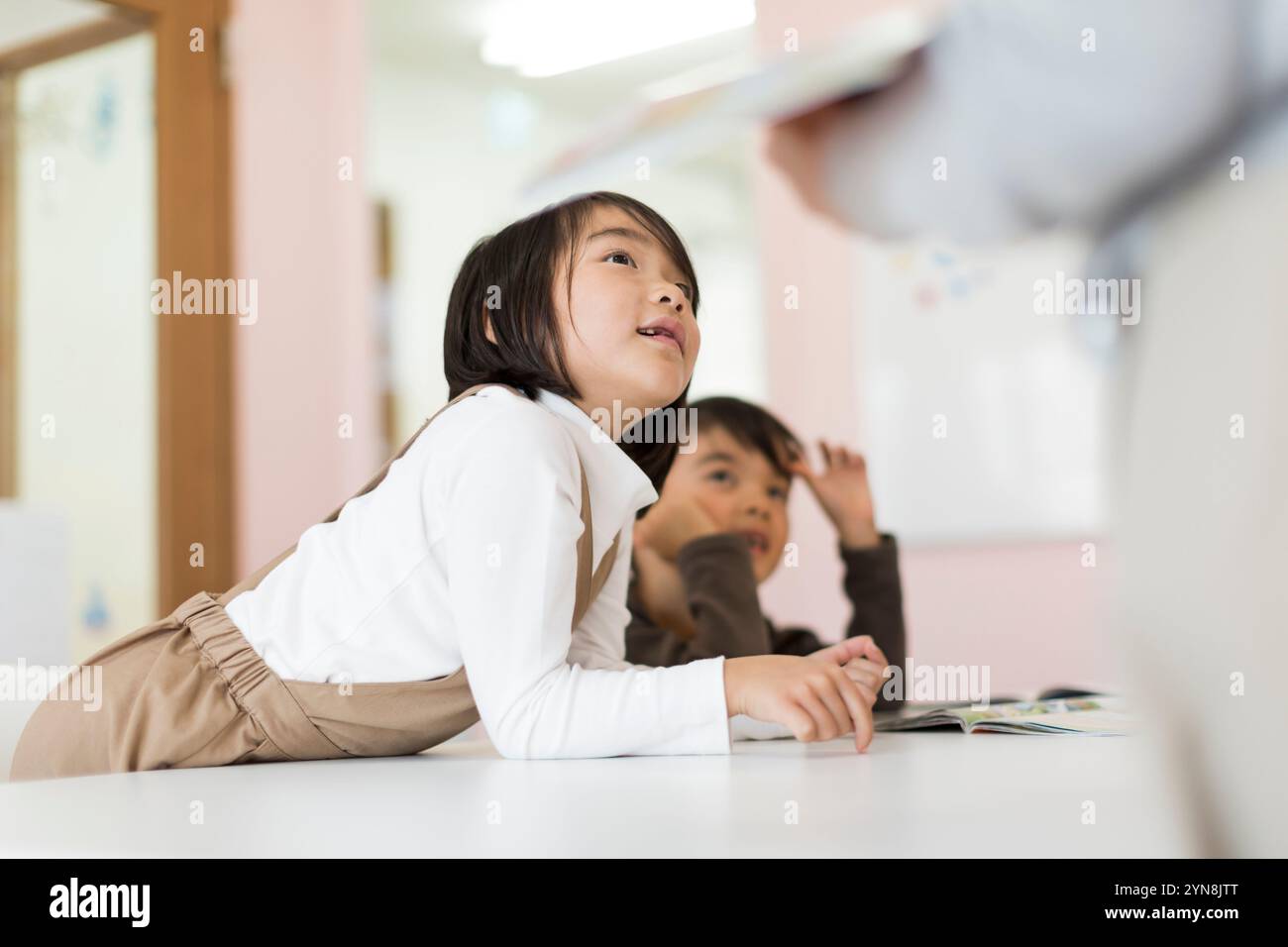 Children taking a class in a classroom Stock Photo - Alamy